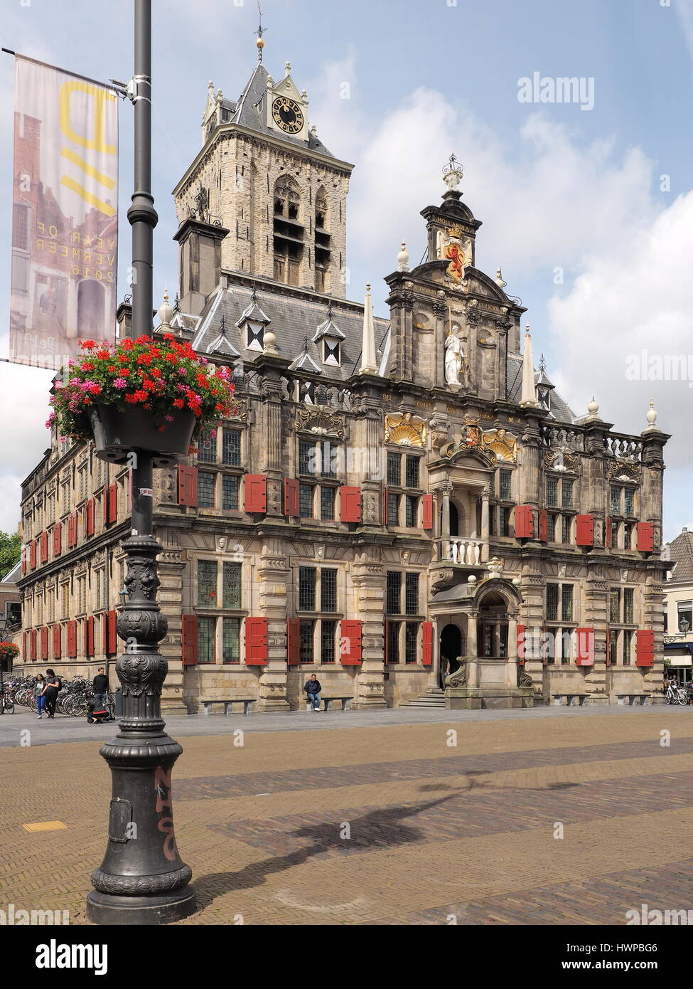 Delft, Netherlands - July 6, 2016: The medieval town hall in the city ...