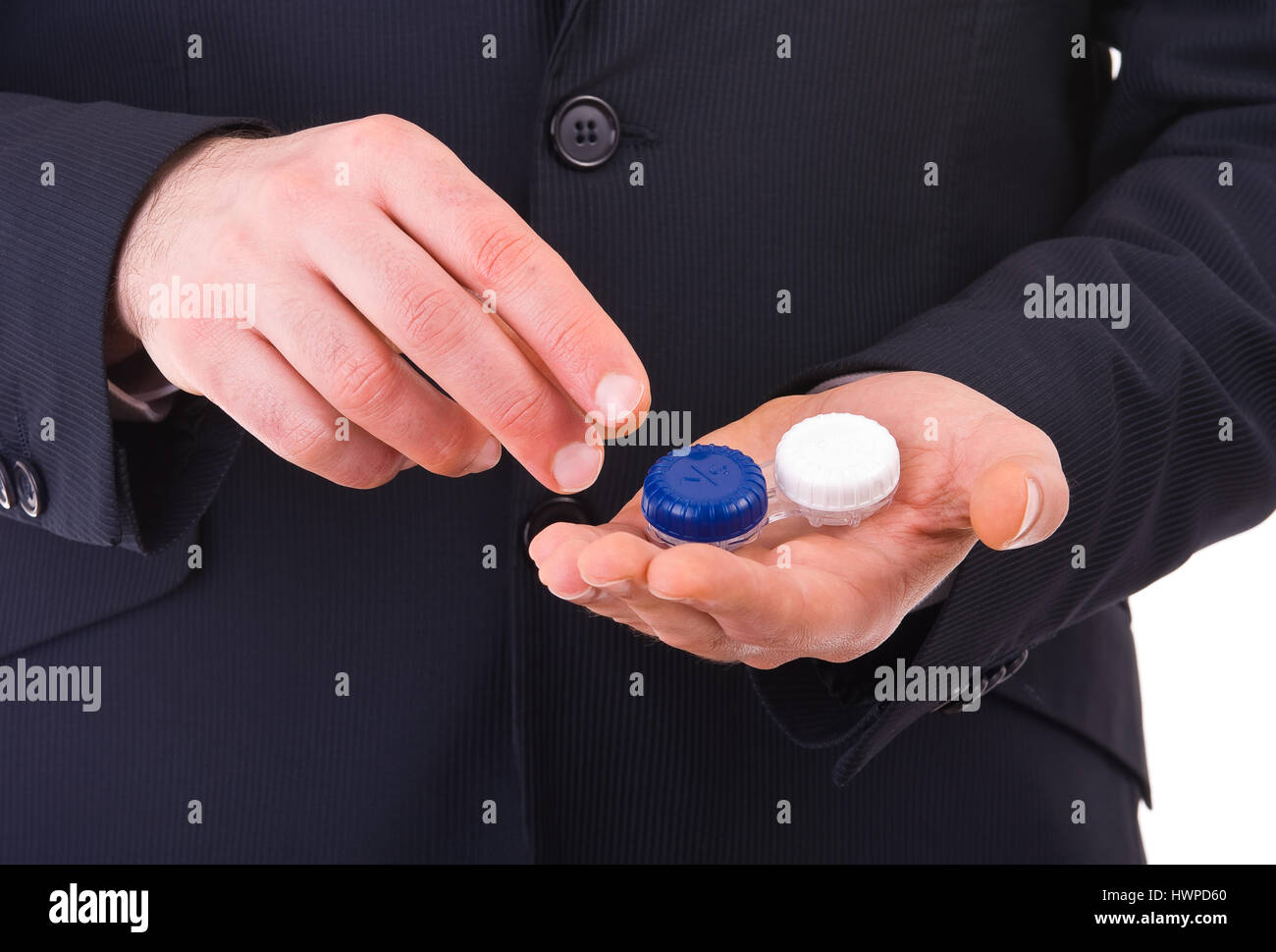 Business man with contact lens case Stock Photo - Alamy