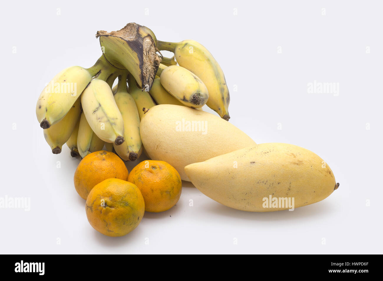 yellow fruit with mango orange and banana for nutrition Stock Photo - Alamy