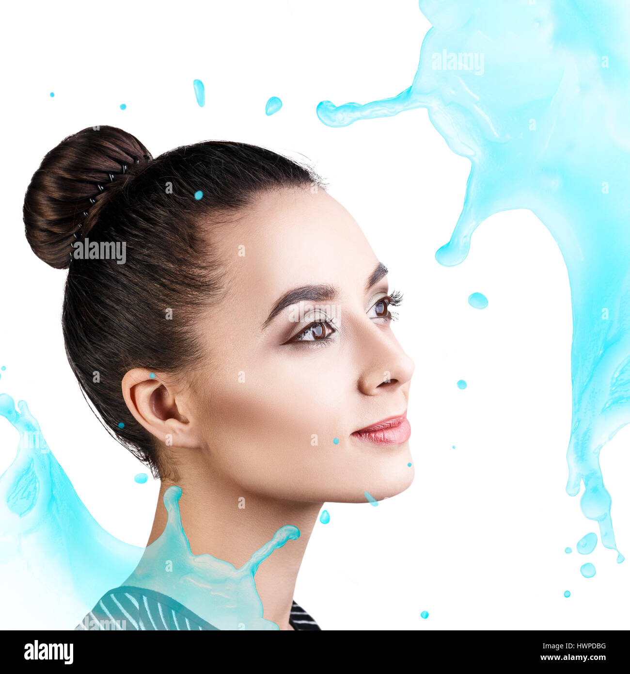 Young woman face in splashes of water over white background. Moistening ...