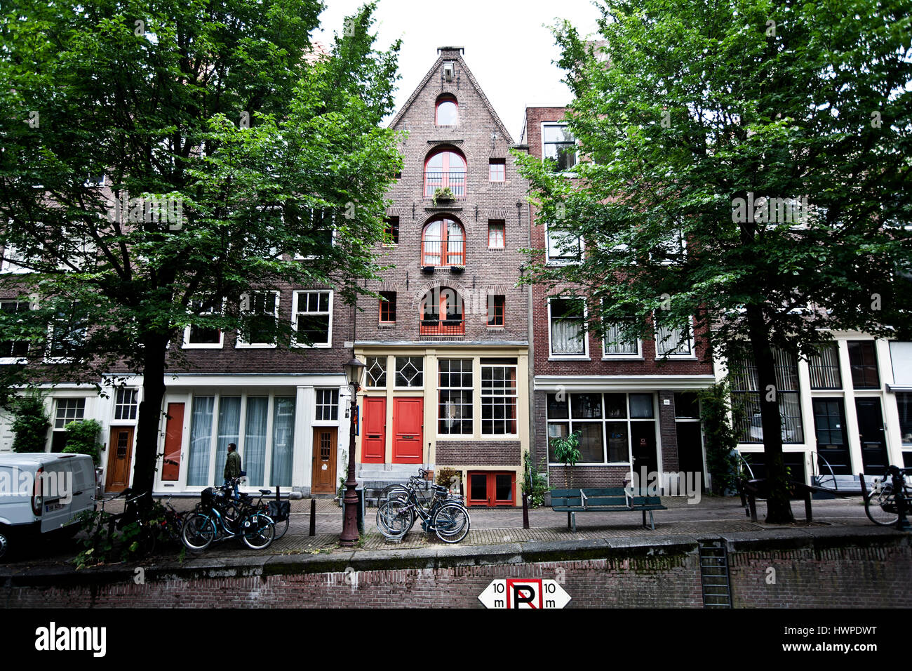 A canal house in Amsterdam. These type of houses are overseeing a canal ...