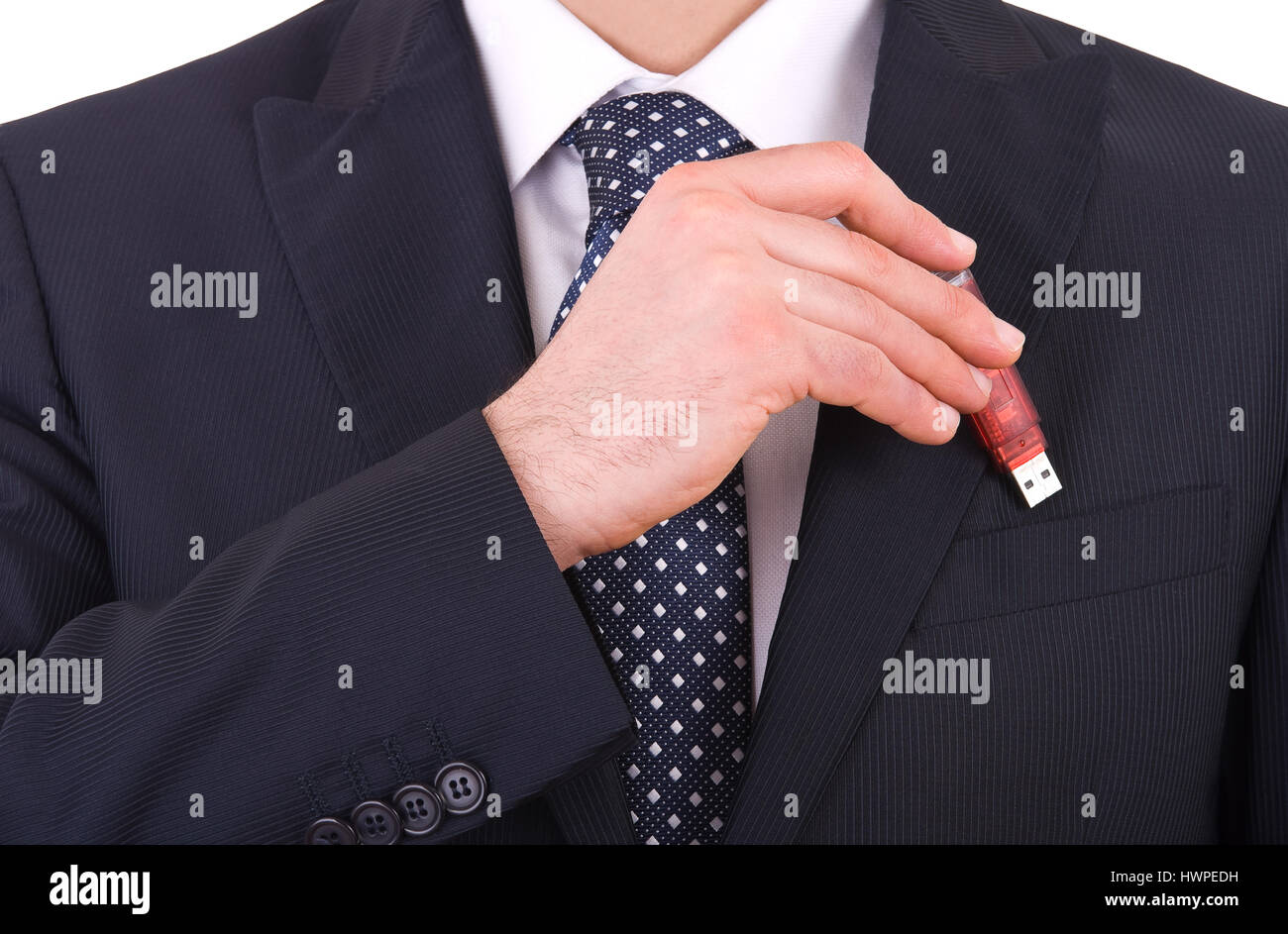 Businessman putting usb stick in his pocket Stock Photo - Alamy