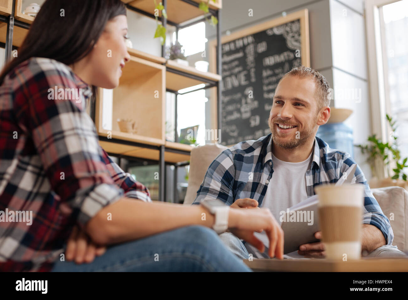 Nice delighted people speaking with each other Stock Photo - Alamy