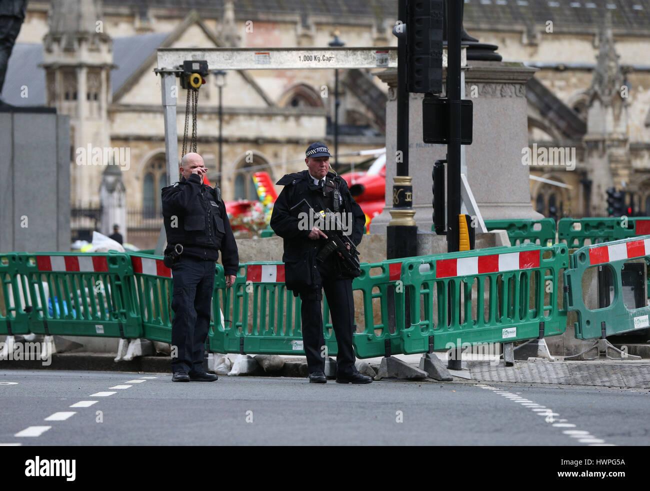 Police close to the Palace of Westminster, London, after policeman has ...