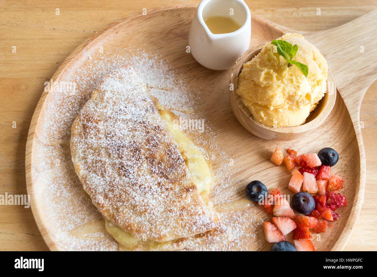 closeup fresh homemade dessert soft vanila roti with cool ice cream ...