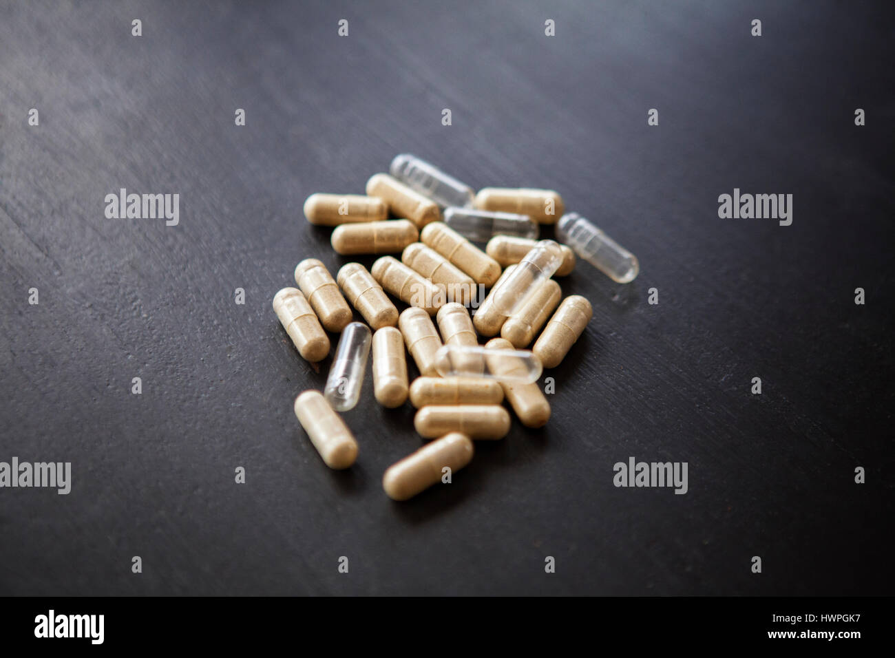 High angle view of capsules on table Stock Photo - Alamy