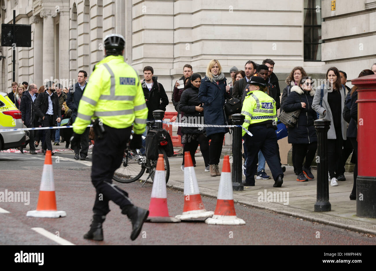 Police close to the Palace of Westminster, London, after policeman has ...