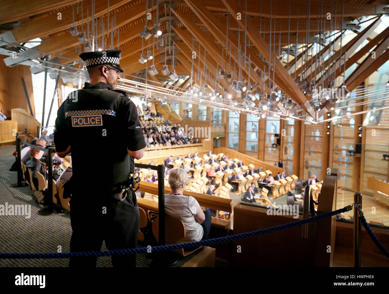 Police presence in the main chamber at the Scottish Parliament in ...