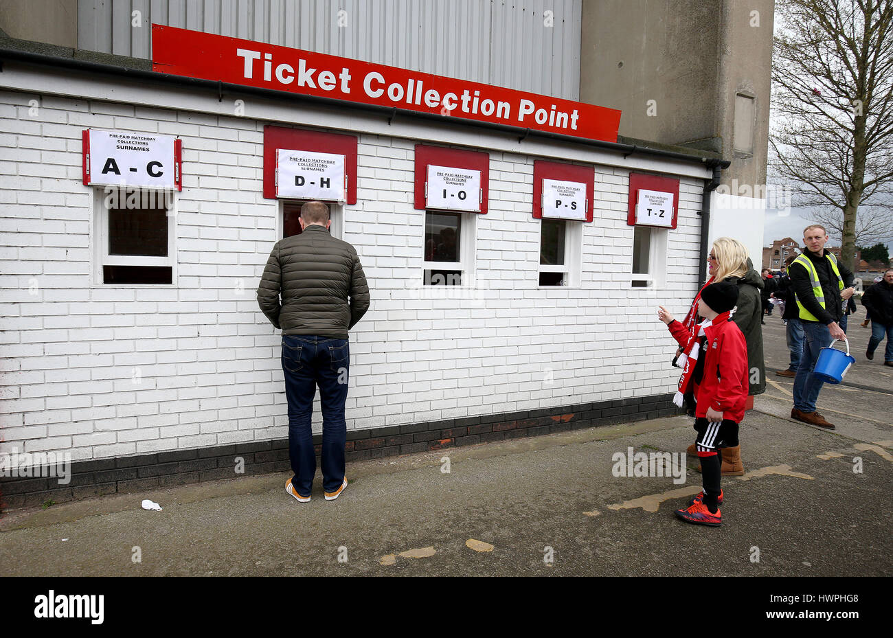 Fans collect tickets Stock Photo - Alamy