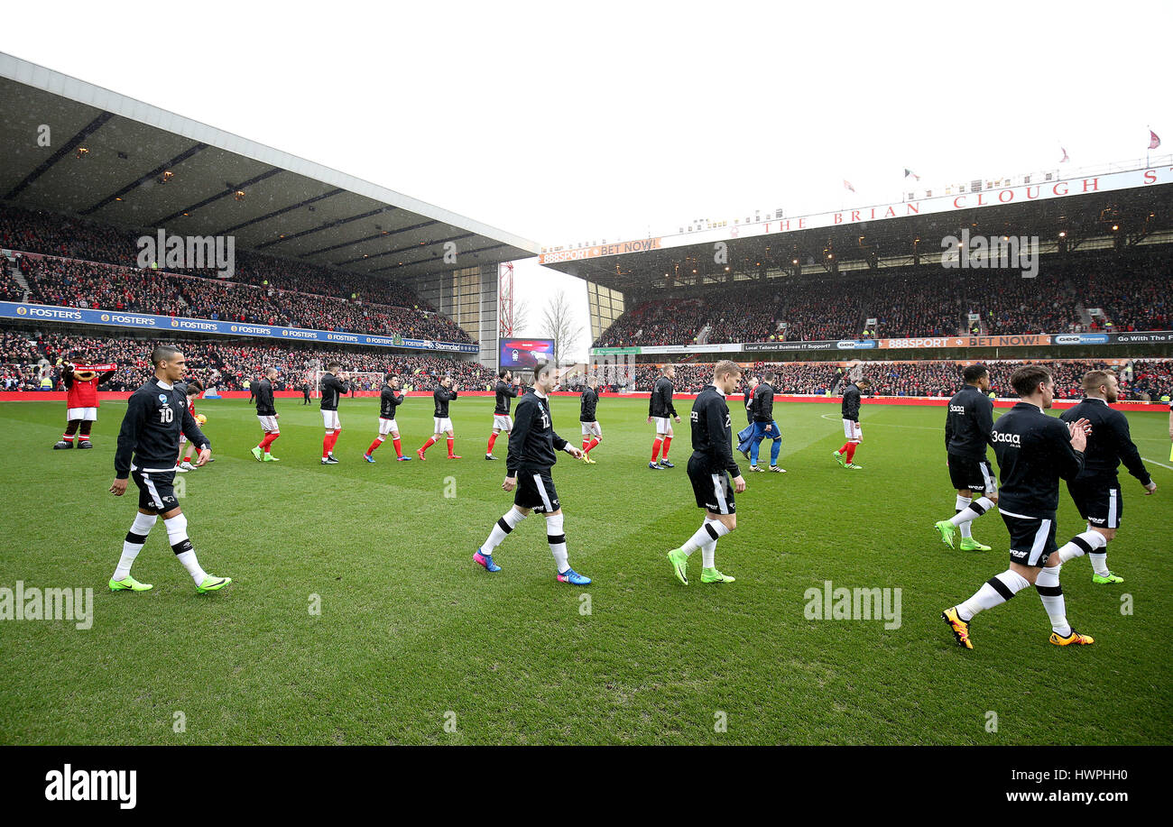 The two team's walk out before kick-off Stock Photo - Alamy