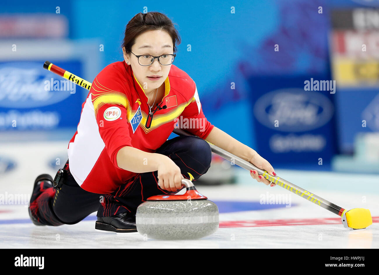 Beijing, China. 22nd Mar, 2017. Zhou Yan of China delivers the stone ...