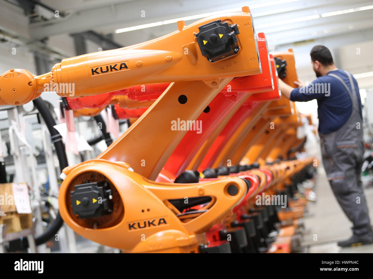 Augsburg, Germany. 22nd Mar, 2017. Kuka robots are assembled in a ...