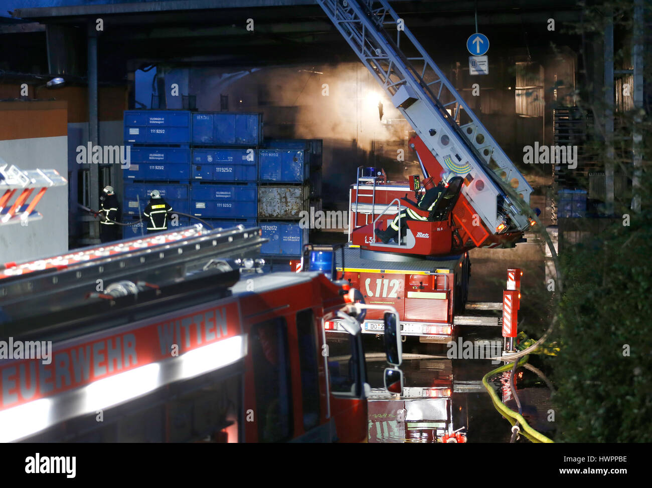 Witten, Germany. 22nd Mar, 2017. Firefighters extinguish a fire at a ...
