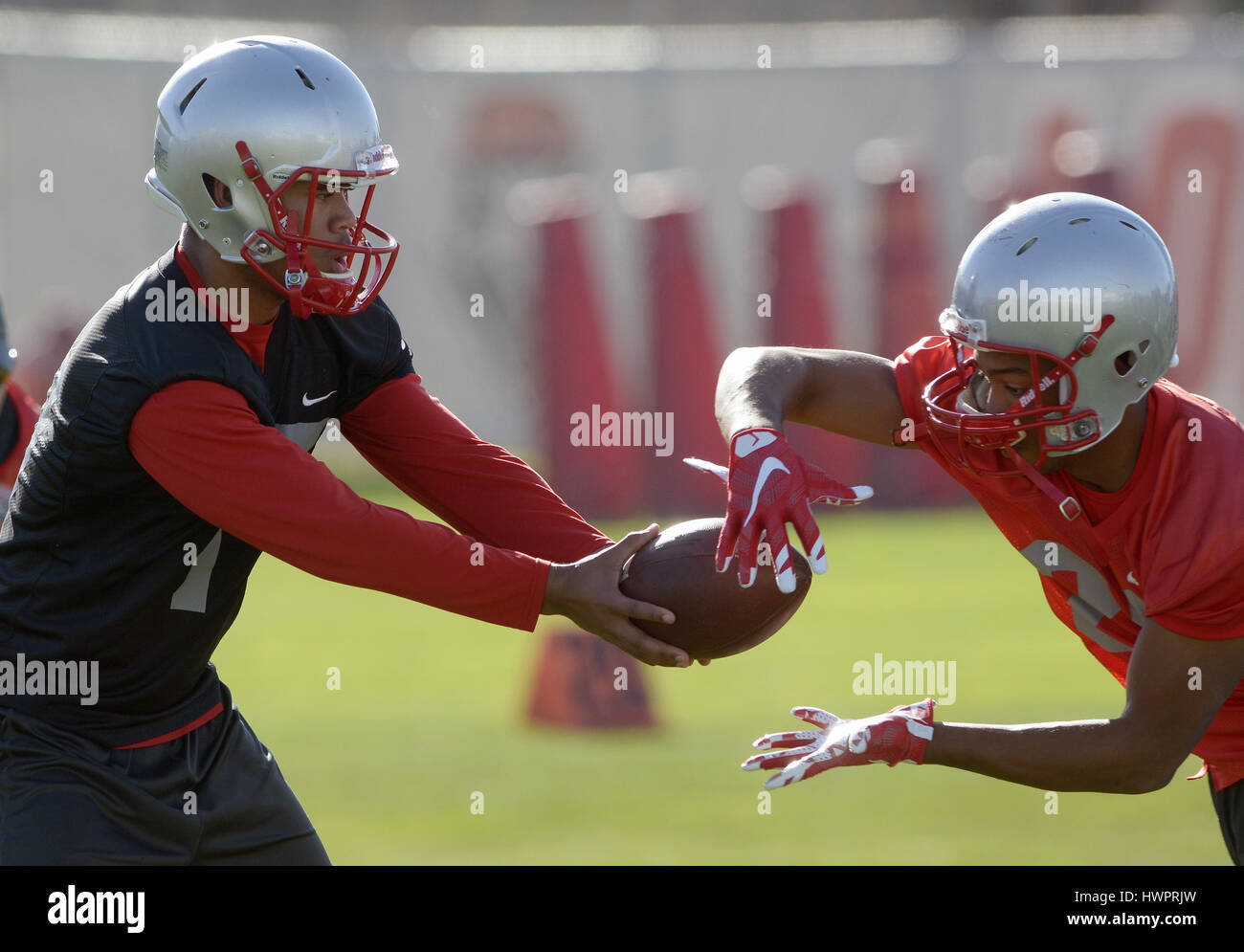 Usa. 22nd Mar, 2017. SPORTS -- UNM quarterback JaJuan Lawson hands of ...