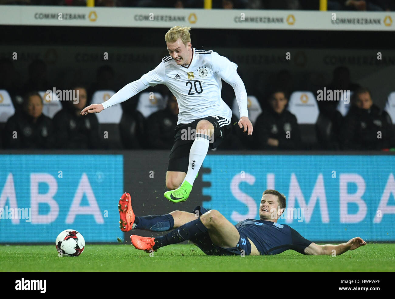 Dortmund, Germany. 22nd Mar, 2017. Germany's Julian Brandt (L) and ...