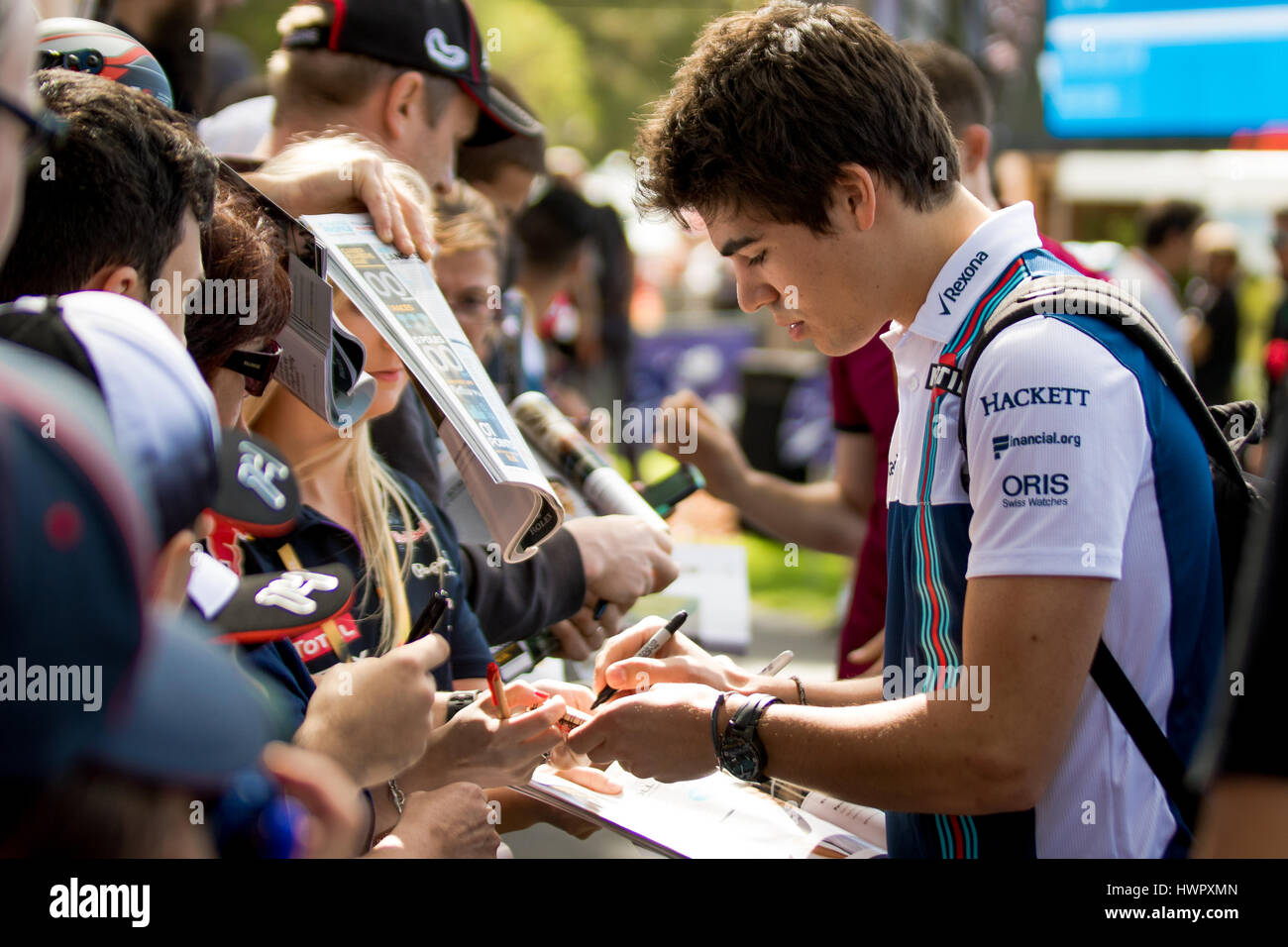 Melbourne, Australia. 23rd Mar, 2017. Lance Stroll signs autographs for ...