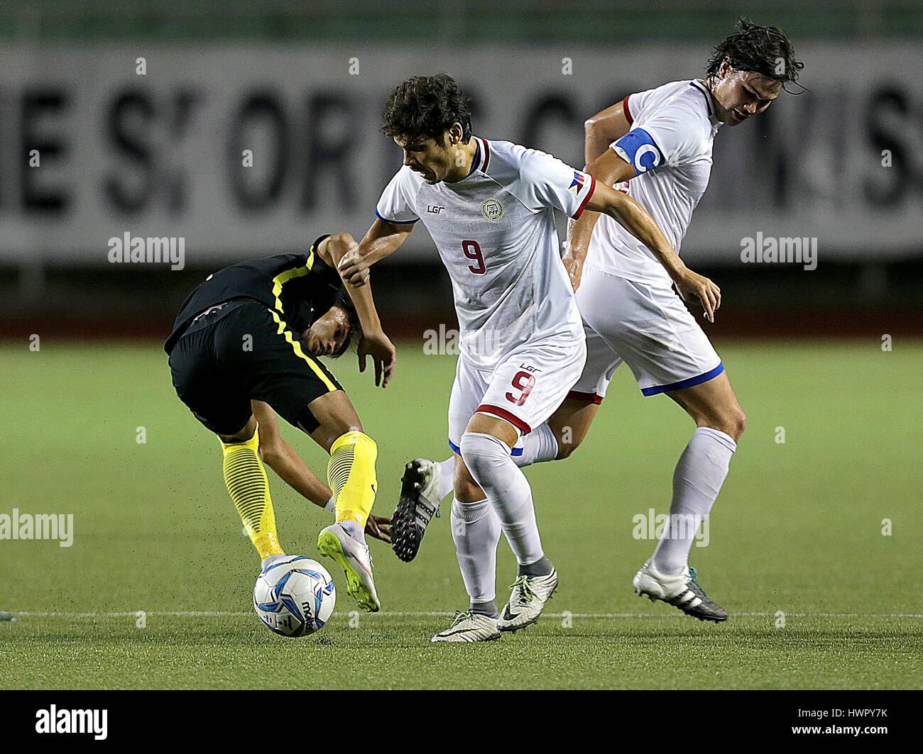 Manila, Philippines. 22nd Mar, 2017. Ahmad Hazwan Bakri of Malaysia (L ...