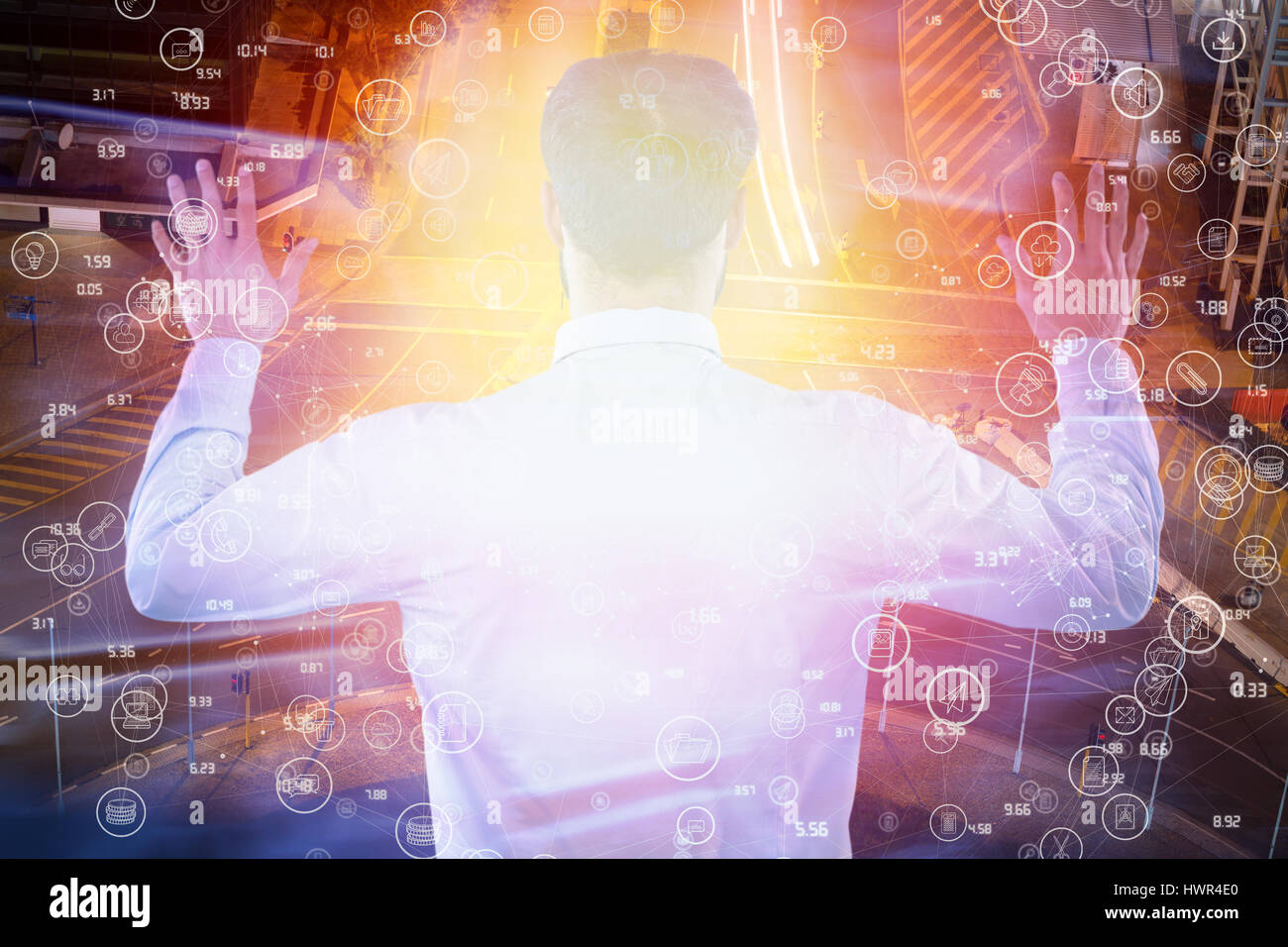 Rear view of entrepreneur pretending to use invisible screen against ...