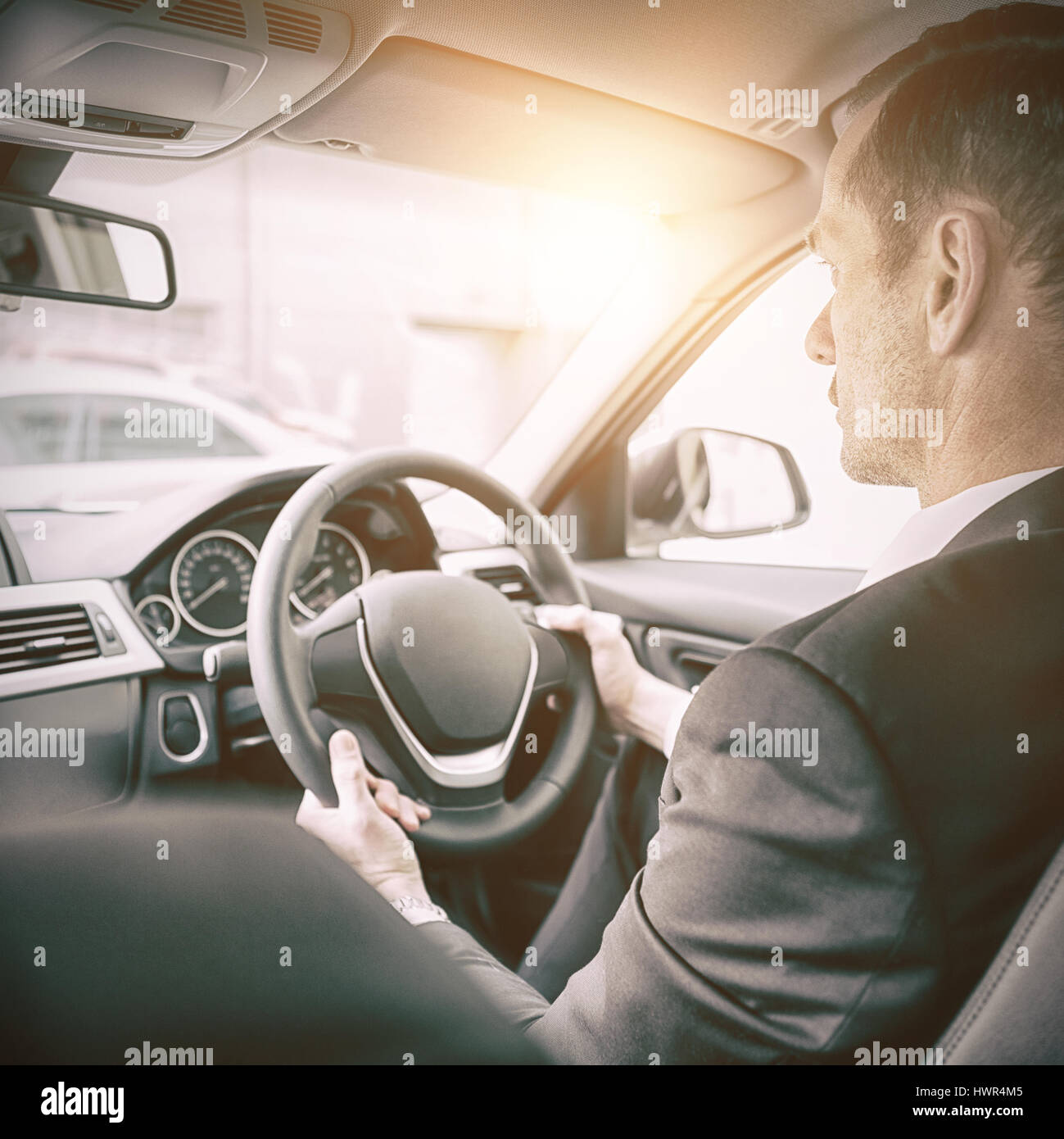 Man driving a car Stock Photo - Alamy