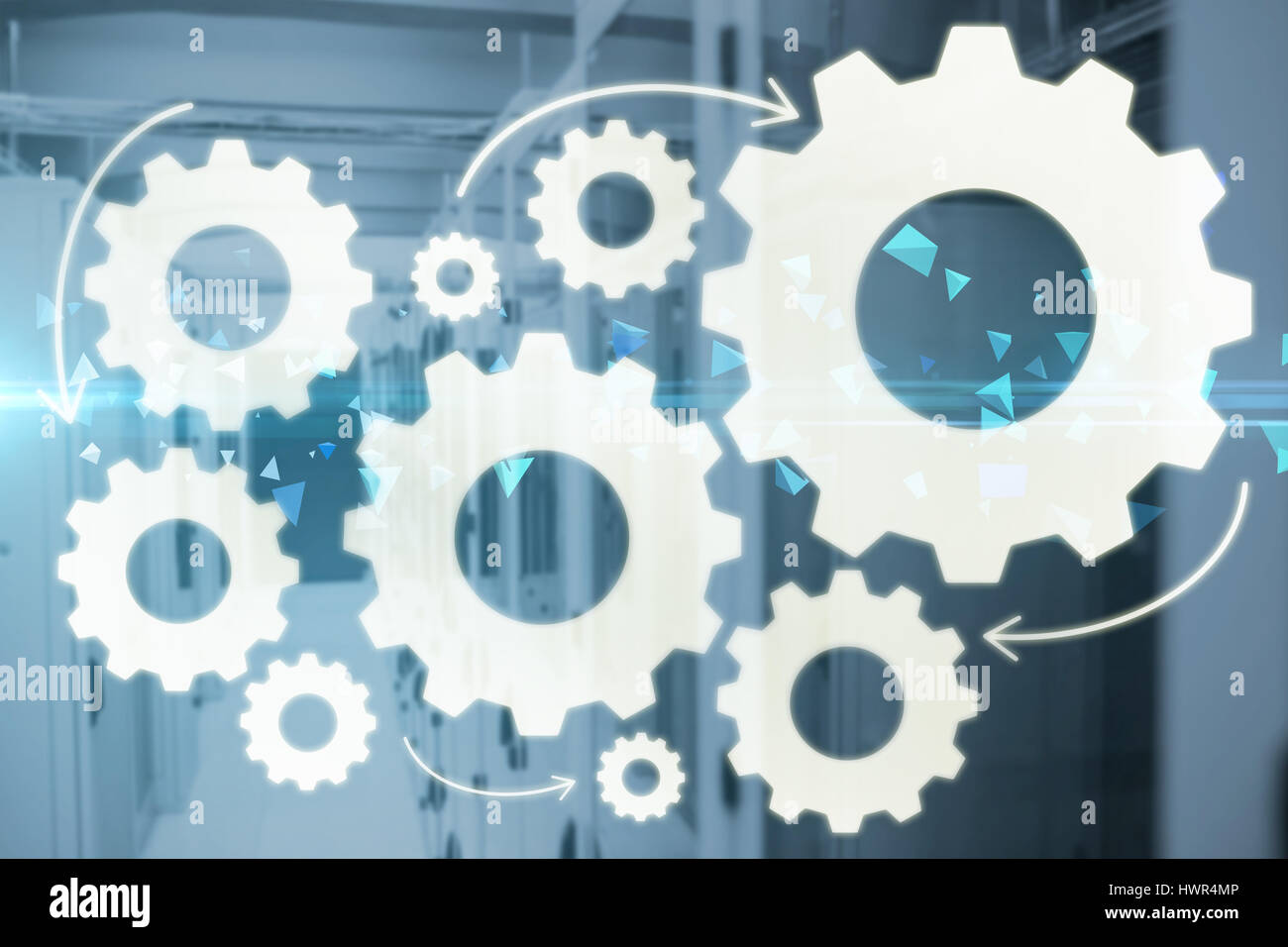 Gears on white background against technical screen with little pyramids ...