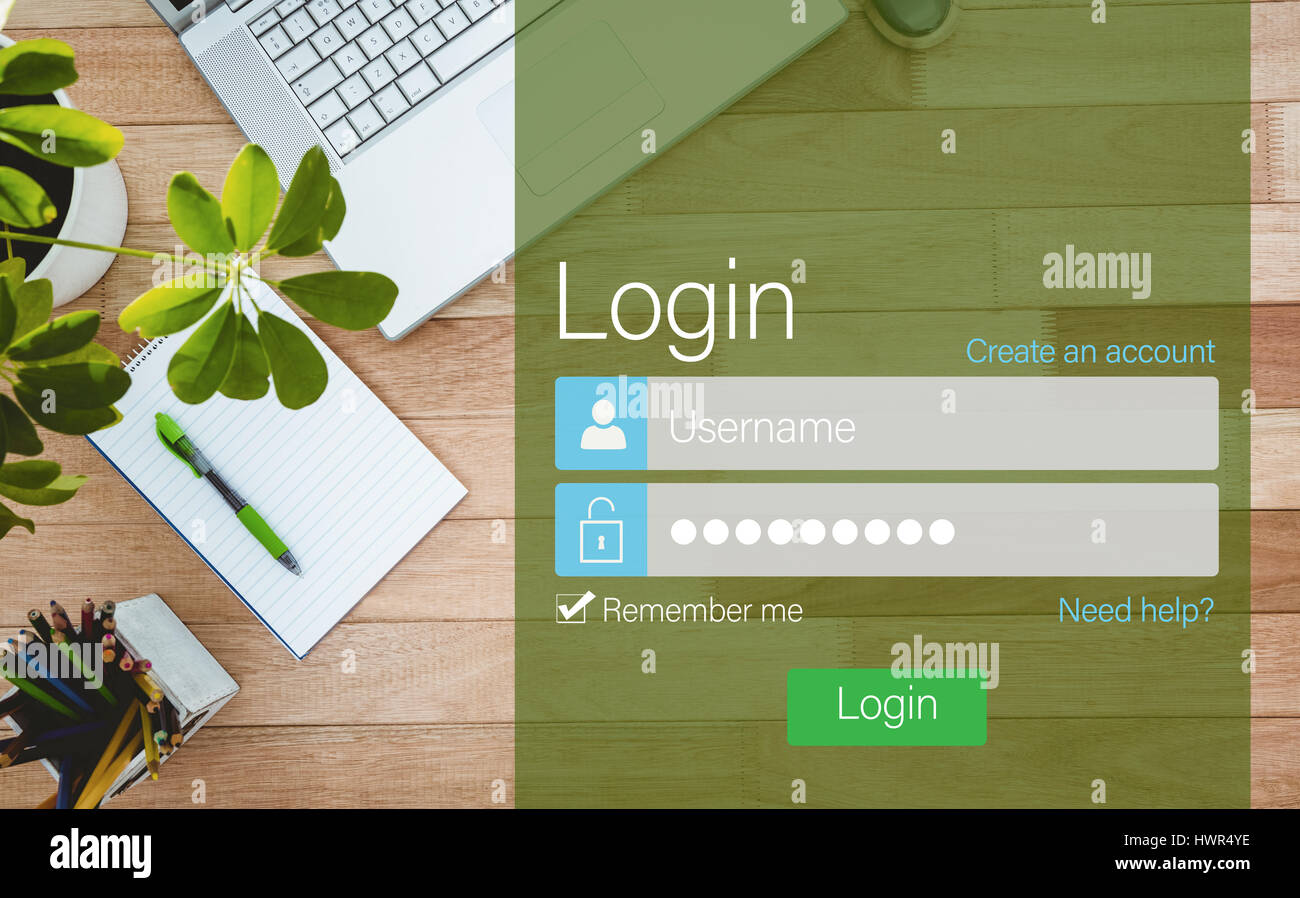 Close-up of login page against business desk with laptop and colors ...