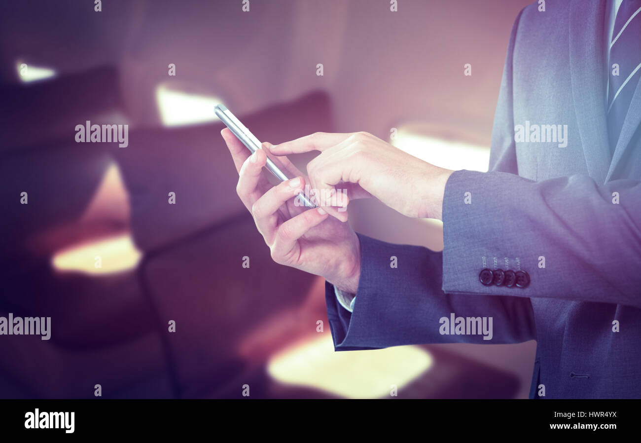 Businessman cell phone plane hi-res stock photography and images - Alamy