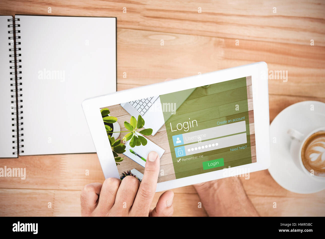 Close-up of login page against hands holding blank screen tablet Stock ...
