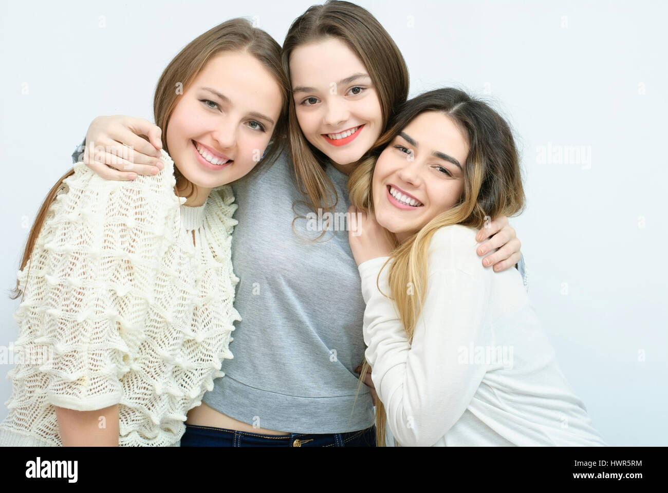 Three happy friends Stock Photo - Alamy