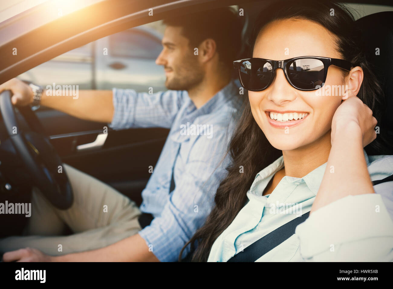 Couple in a car Stock Photo - Alamy