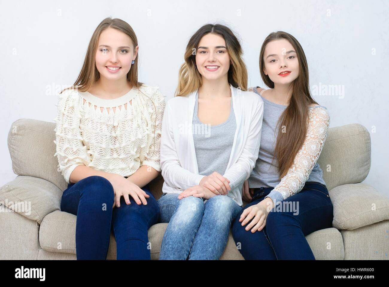 Three happy friends Stock Photo - Alamy