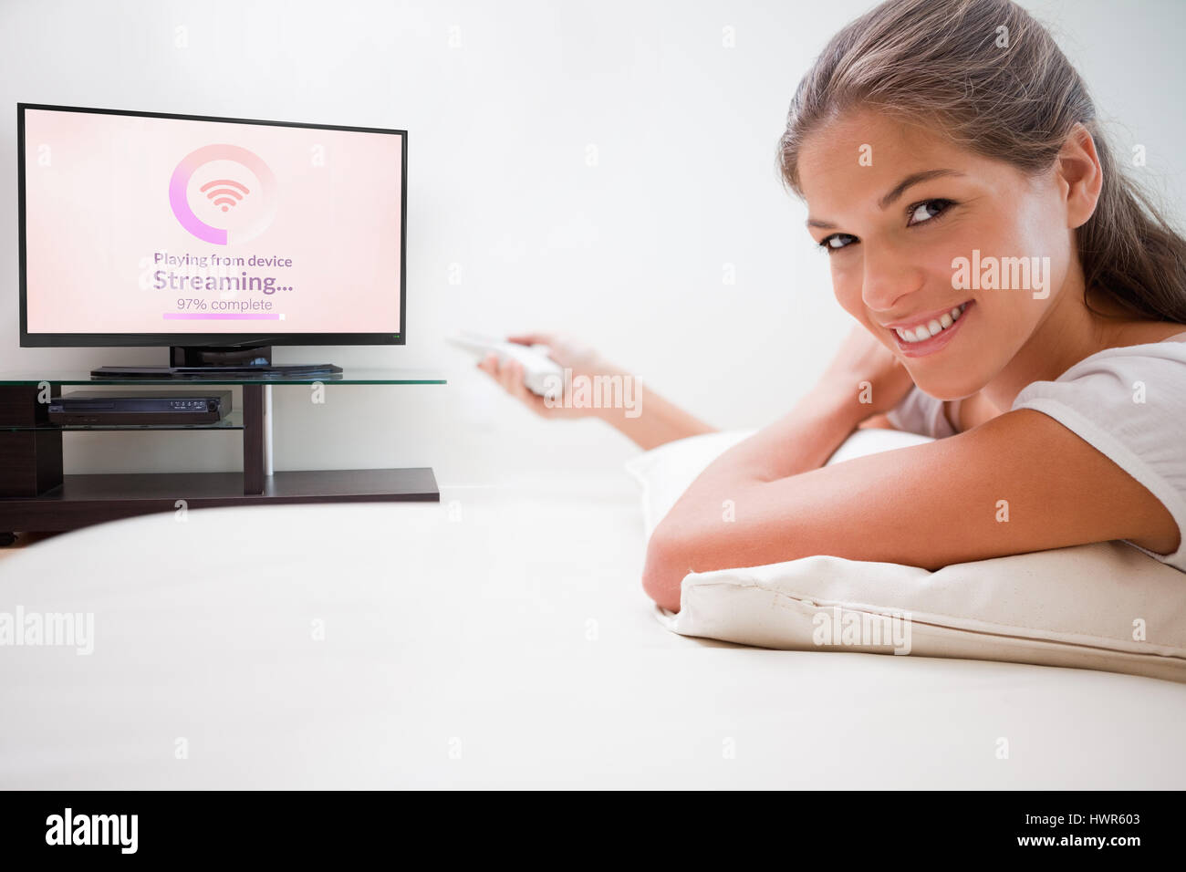 Composite image of text with wi-fi symbol against smiling woman ...