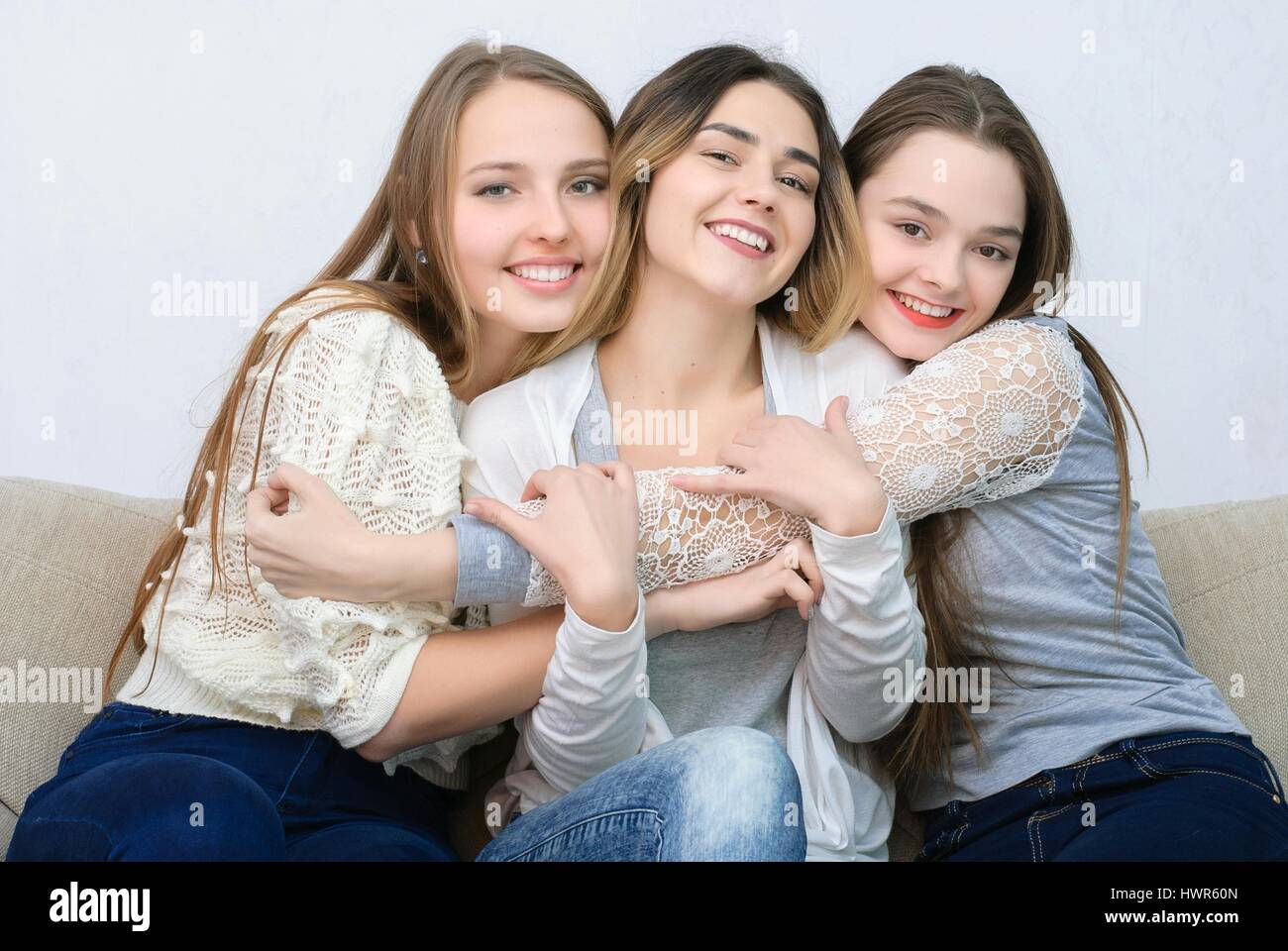 Three happy friends Stock Photo - Alamy