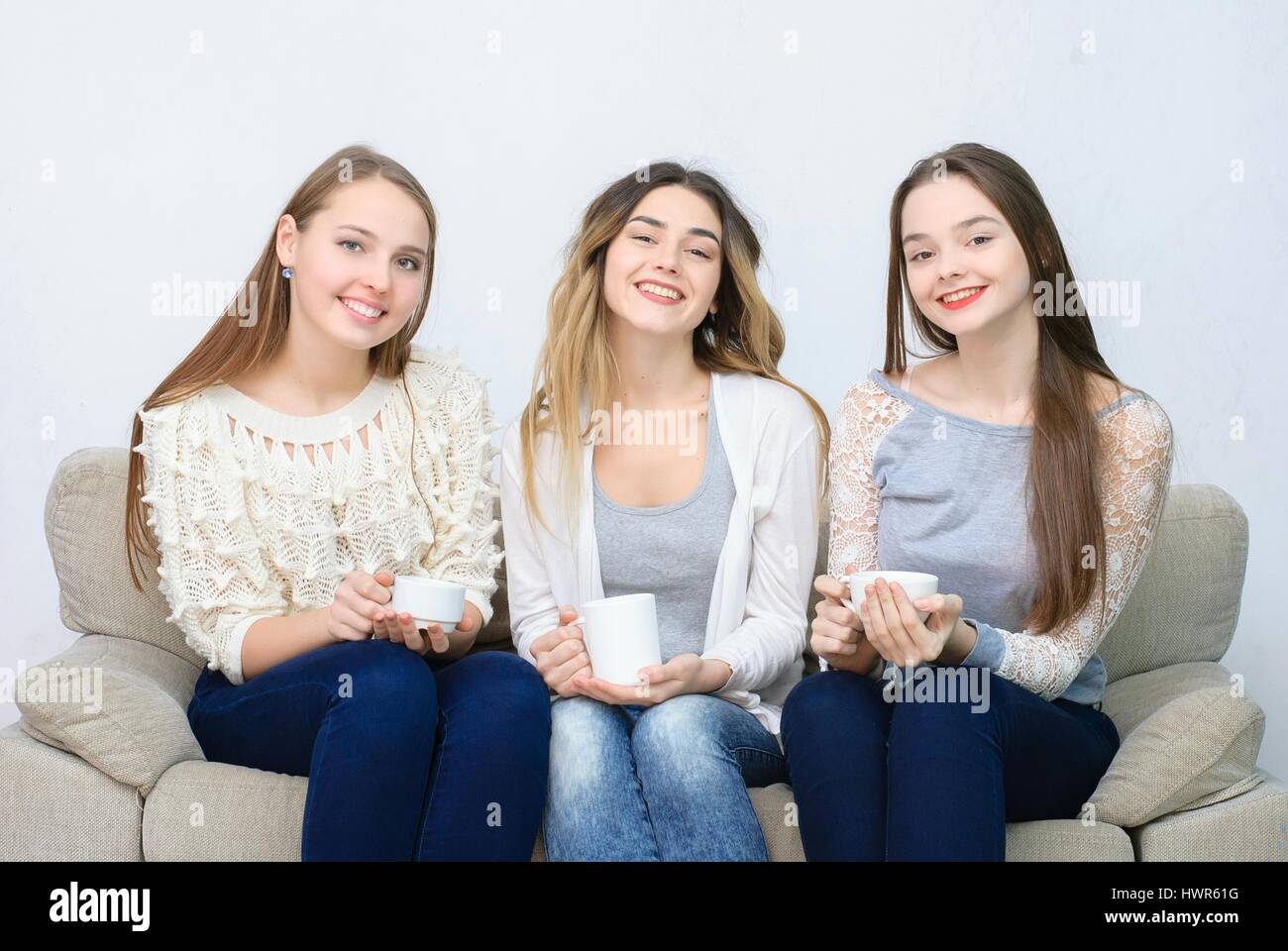 Three happy friends Stock Photo - Alamy