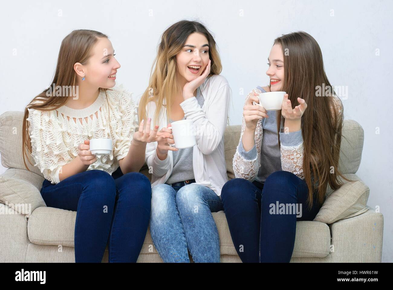 Three happy friends Stock Photo - Alamy