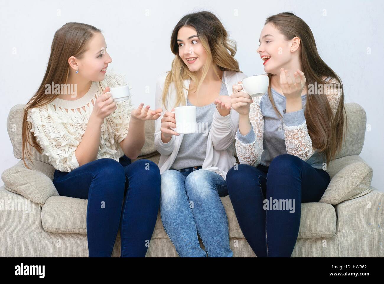 Three happy friends Stock Photo - Alamy
