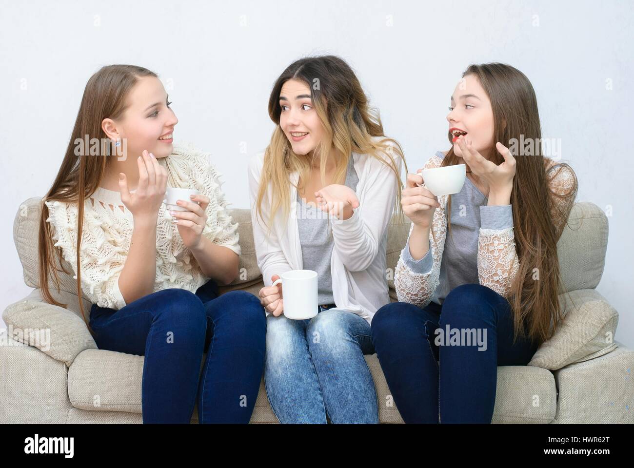 Three happy friends Stock Photo - Alamy