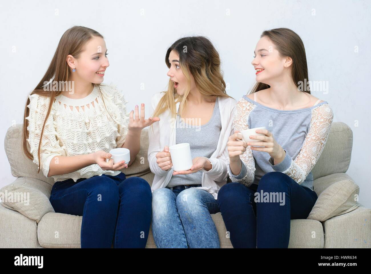 Three happy friends Stock Photo - Alamy