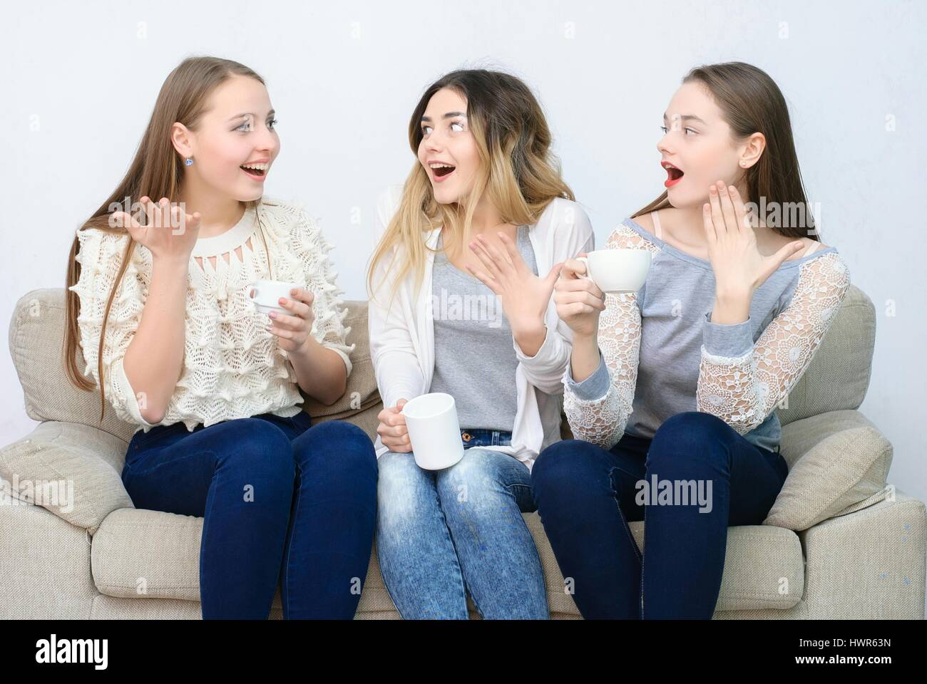 Three happy friends Stock Photo - Alamy