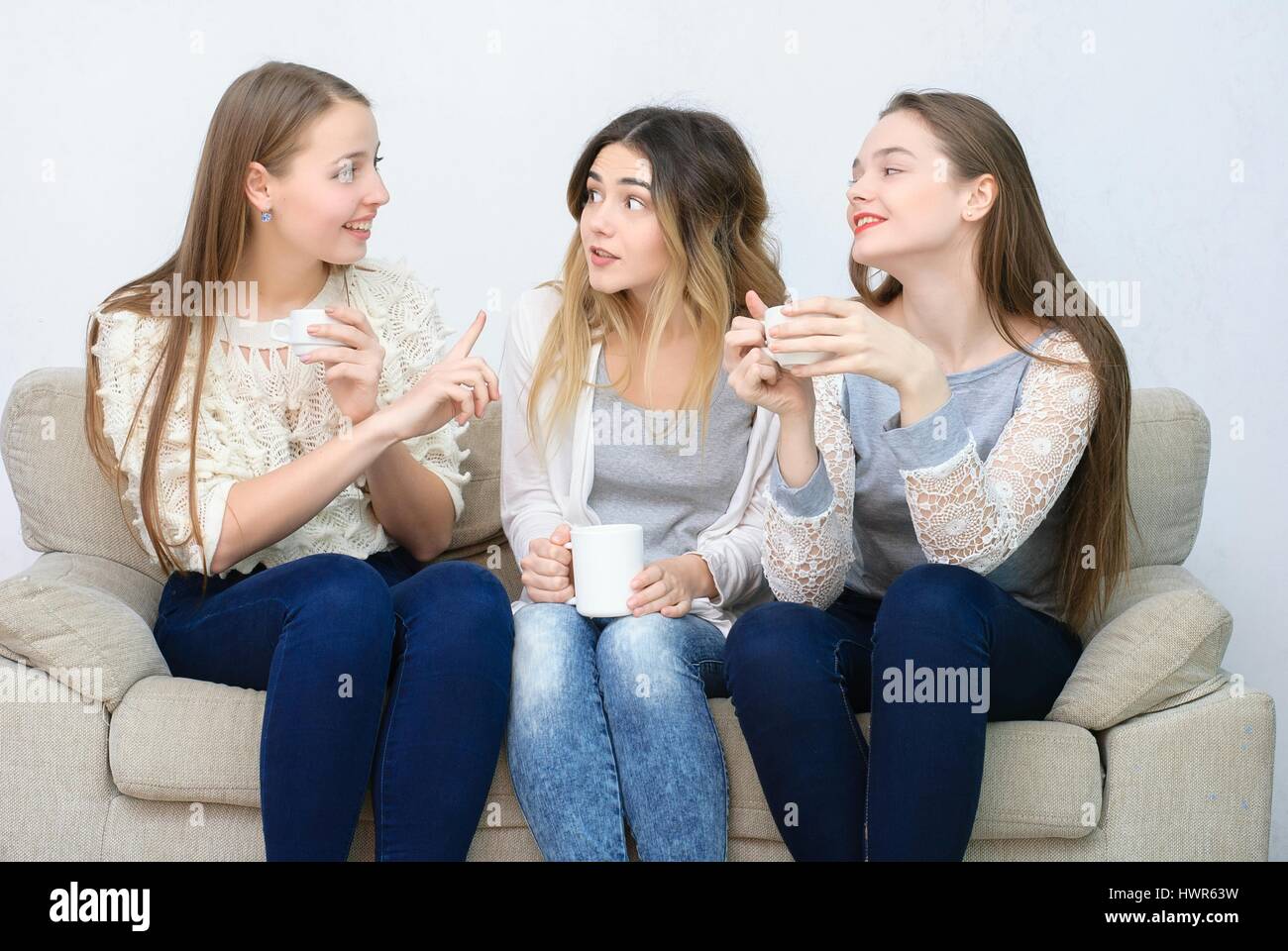 Three happy friends Stock Photo - Alamy