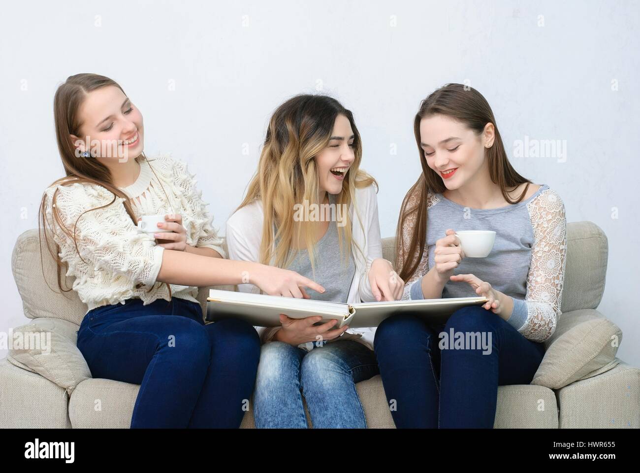 Three happy friends Stock Photo - Alamy