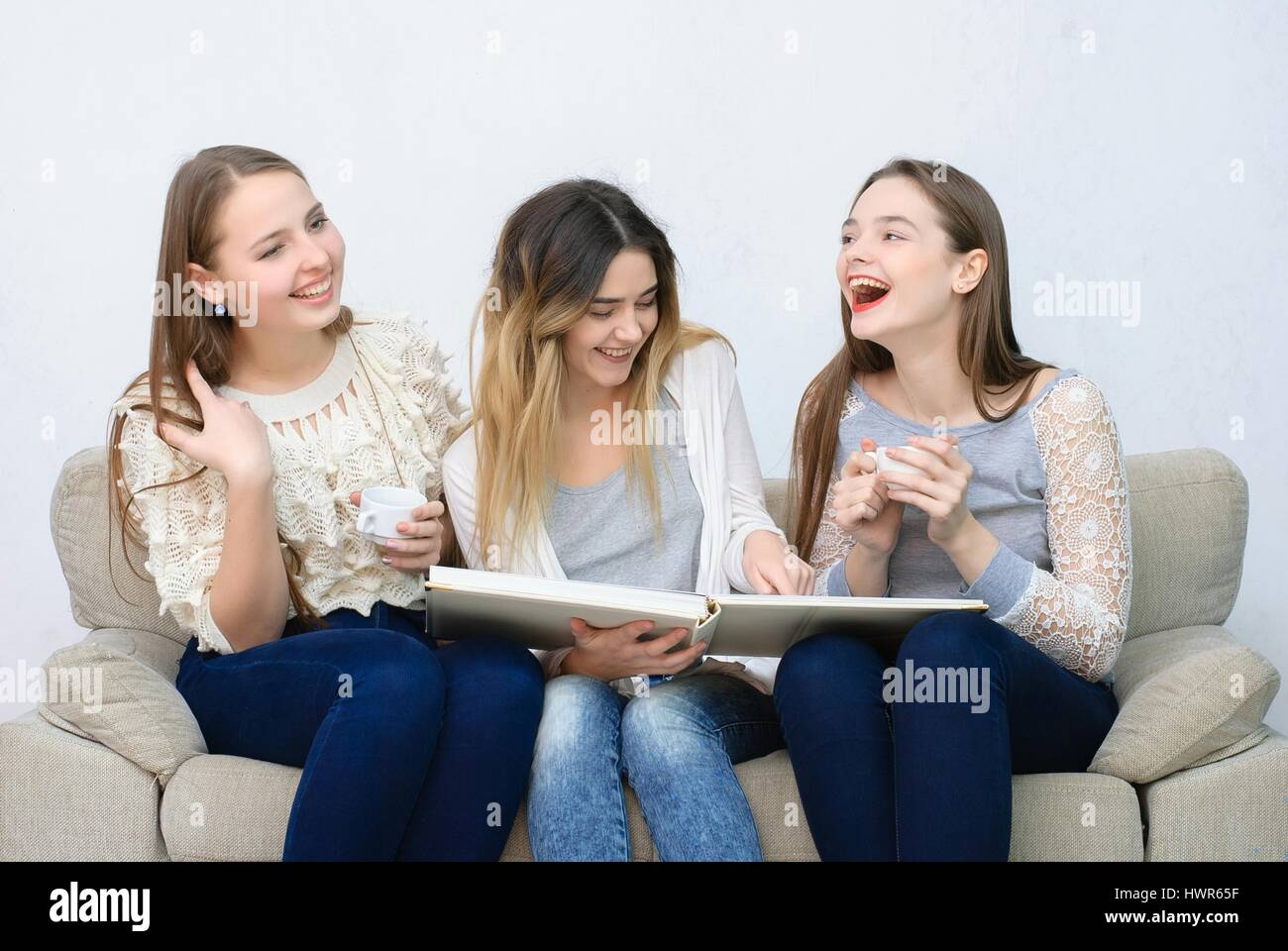 Three happy friends Stock Photo - Alamy