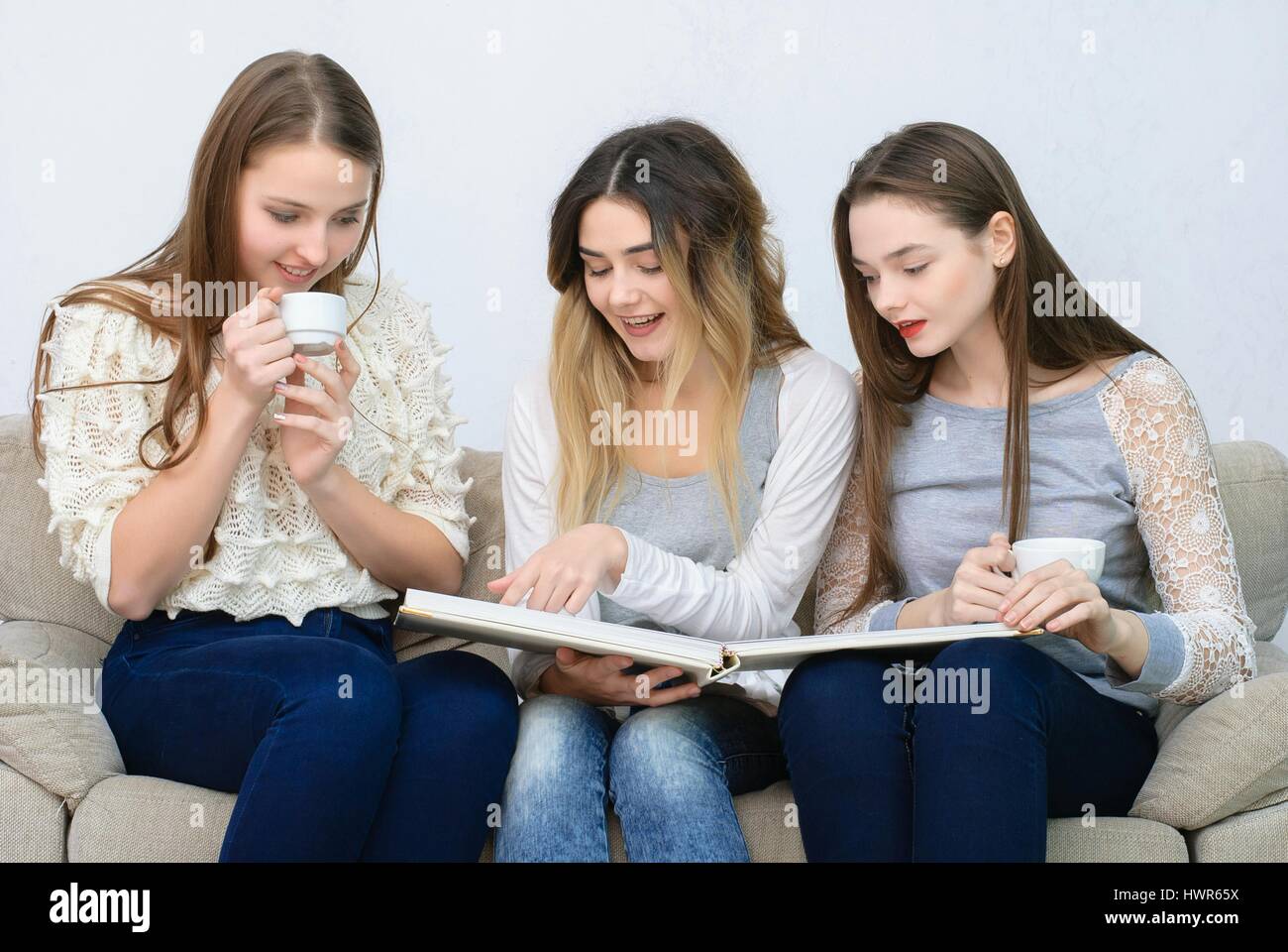 Three happy friends Stock Photo - Alamy