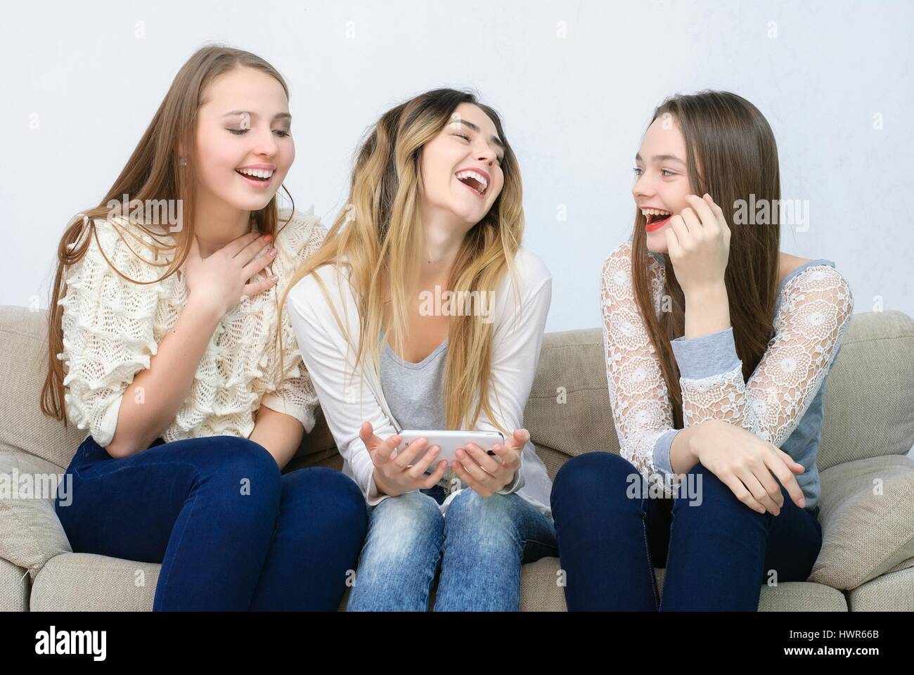 Three happy friends Stock Photo - Alamy