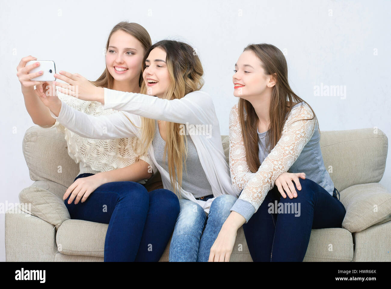 Three happy friends Stock Photo - Alamy