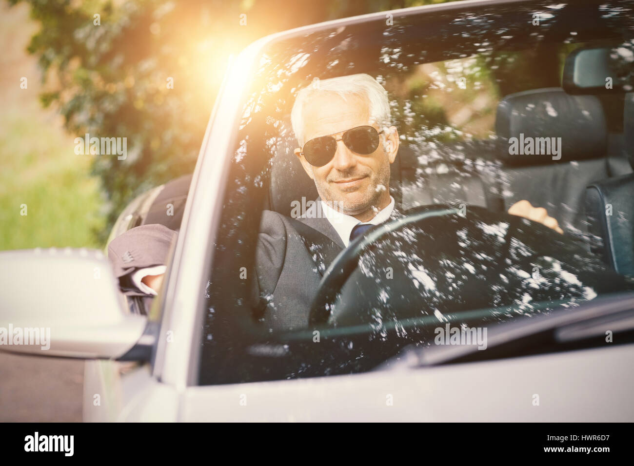 Men driving a car Stock Photo - Alamy