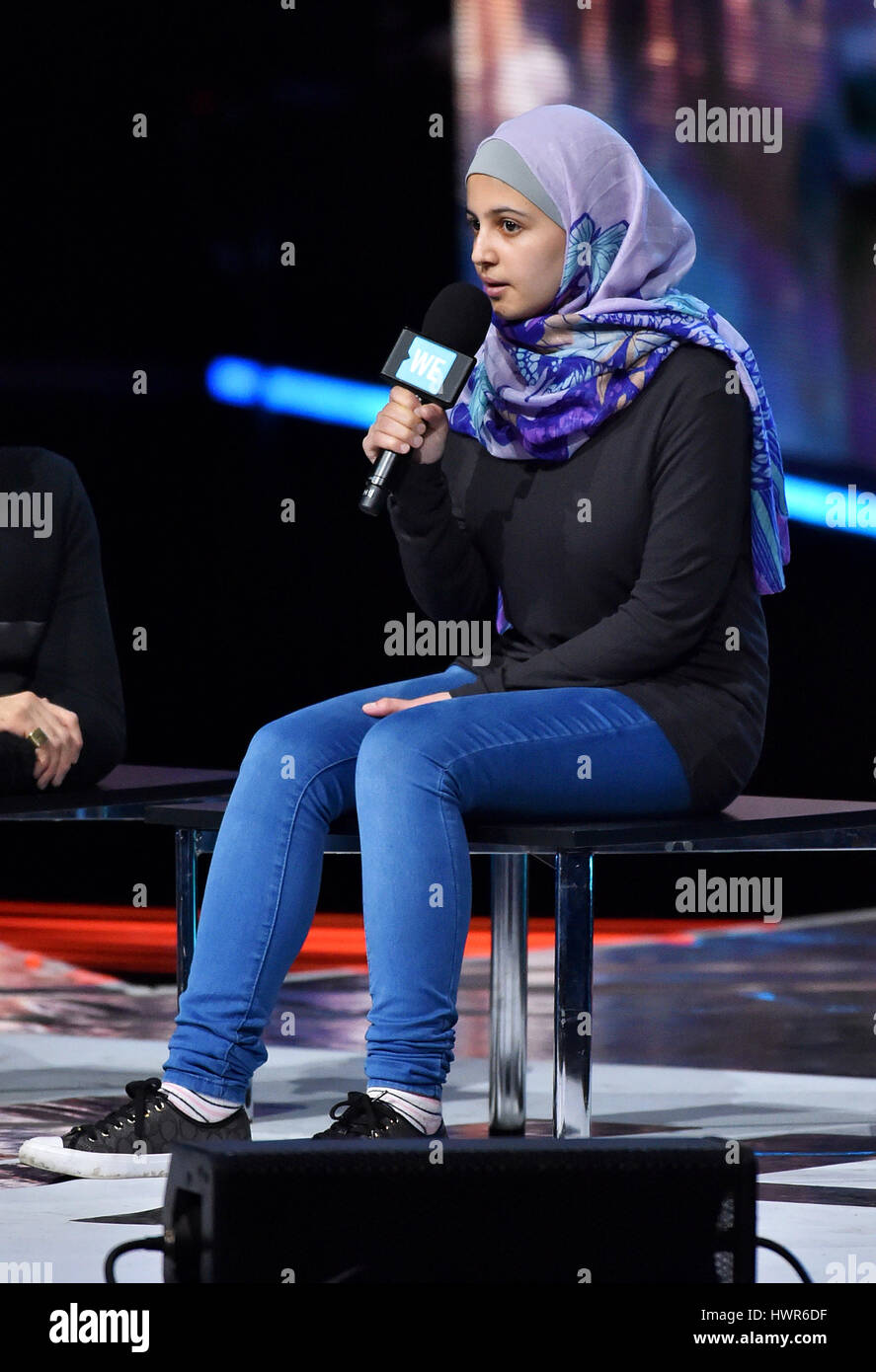 Muzoon Almellehan on stage at the We Day UK charity event and concert ...