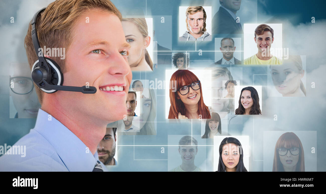Handsome agent with headset against dark blue background Stock Photo ...