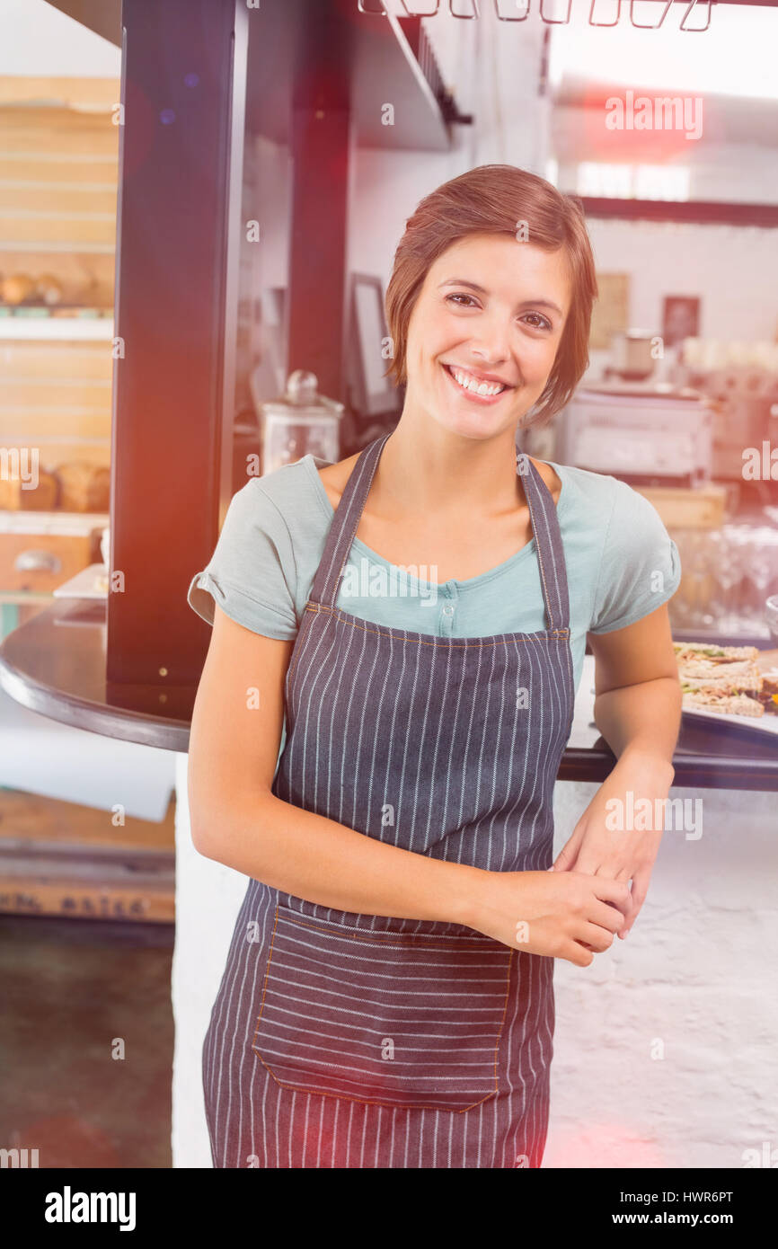 Portrait of pretty waitress smiling at coffee shop Stock Photo - Alamy