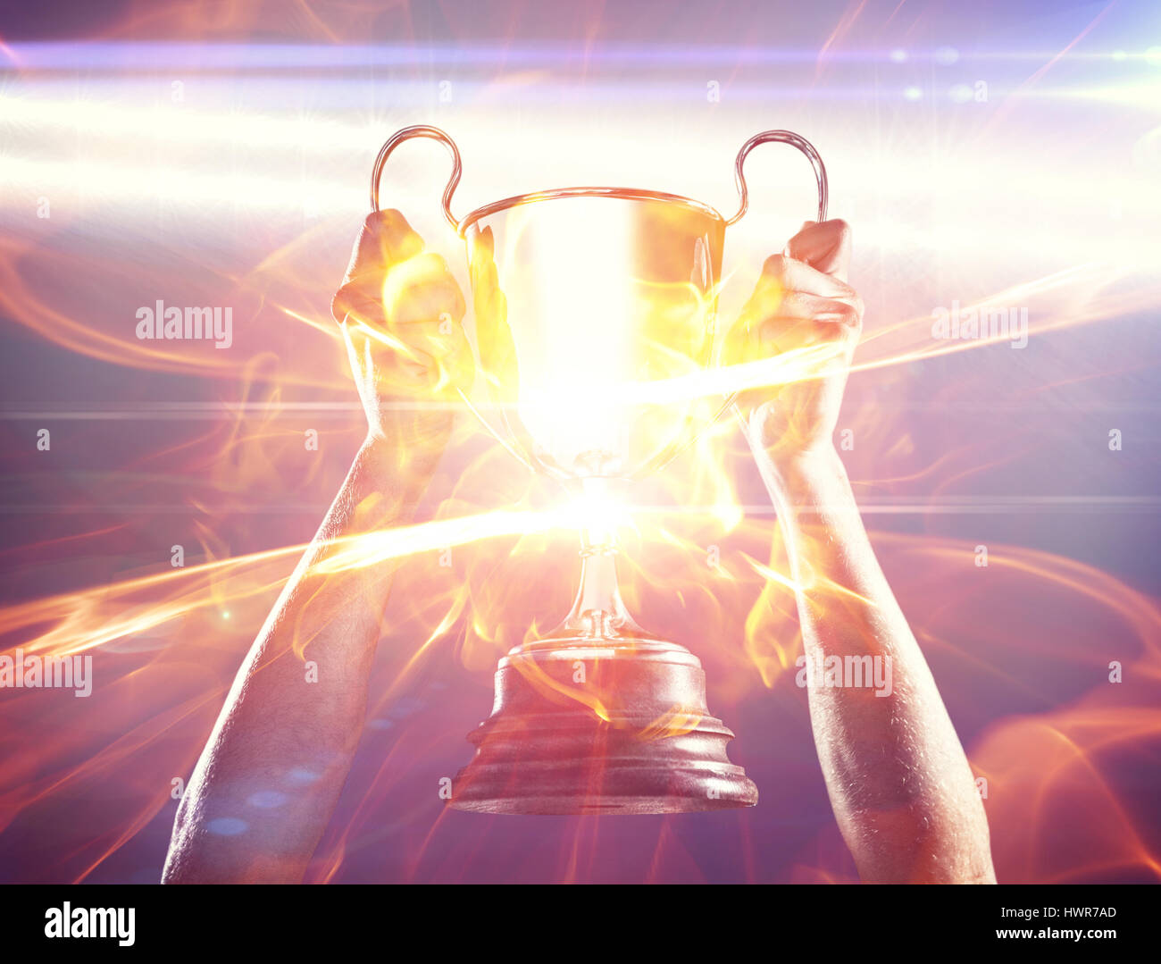 Ball of fire against cropped image of hands holding trophy 3d Stock ...