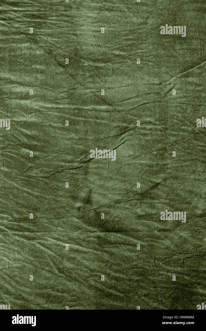 Texture of dark khaki crumpled fabric Stock Photo - Alamy